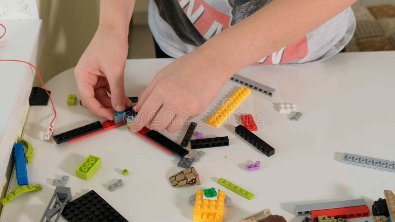 Smart Child Boy Repairs of Robots Parts with Artificial Intelligence ...