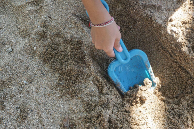 Child S Hands Playing with Sand on the Beach. Stock Photo - Image of ...