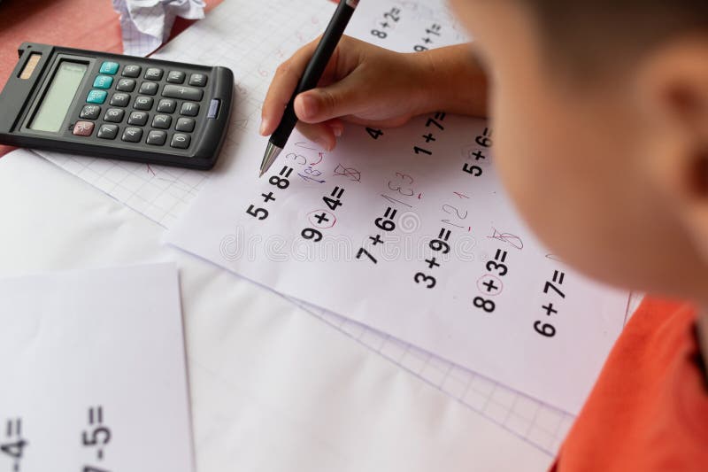 Over the Shoulder View of a Child Who Has Dyslexia and Dyscalculia ...