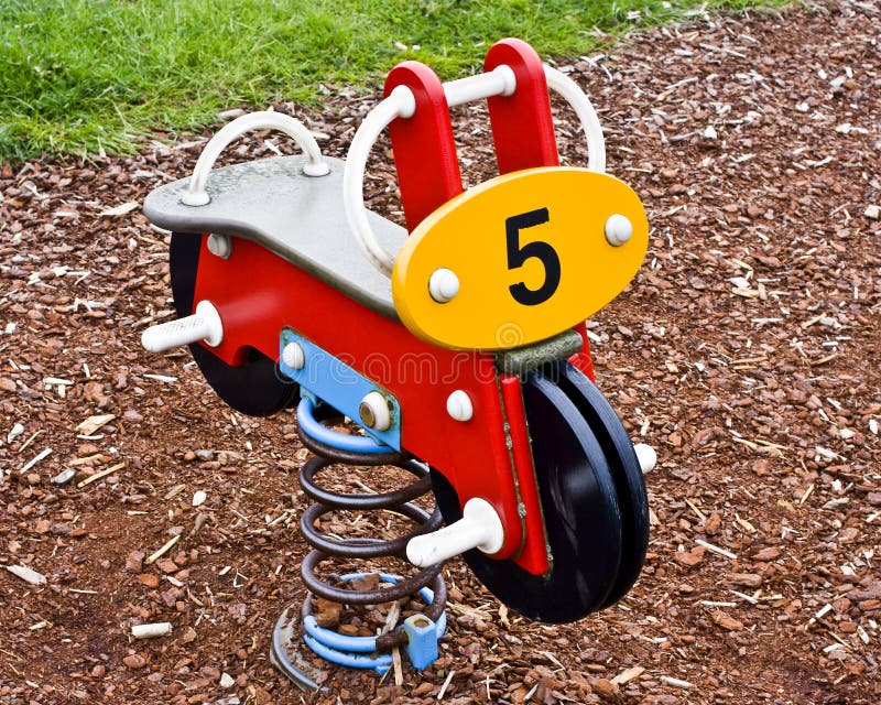 Motorbike Spring Toy in Playground Stock Photo - Image of recreation ...