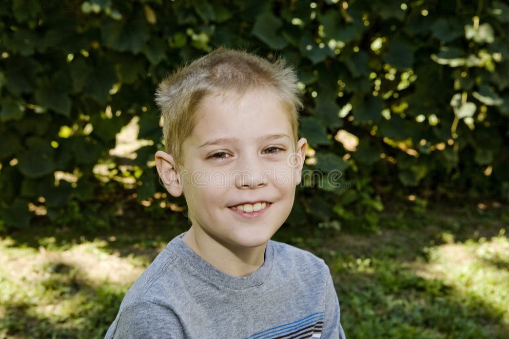Child s portrait stock photo. Image of smirk, child, outside - 15372374