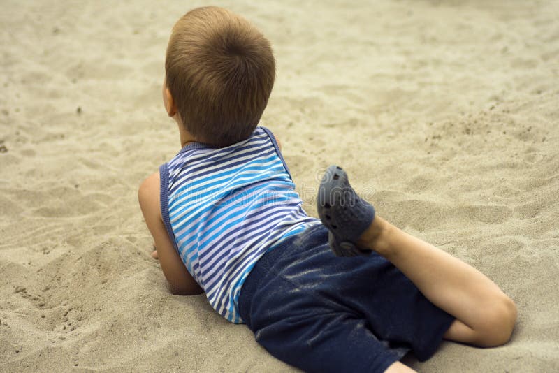 Child in sand stock photo. Image of sand, beige, child - 97695432