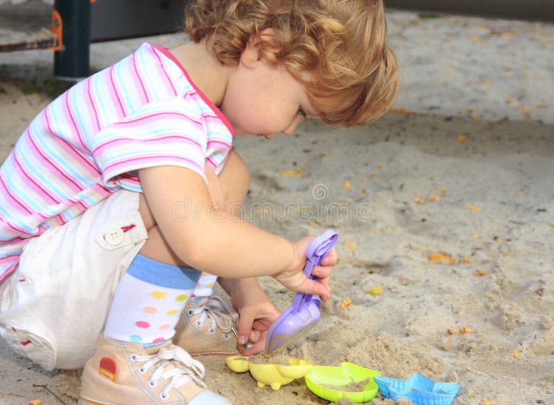 Child in the sandbox stock image. Image of outdoors, playground - 5689977