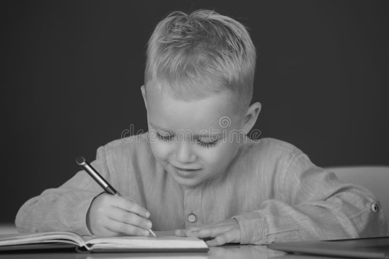 Kid Writing in Class. School Child Student Learning in Class, Study ...