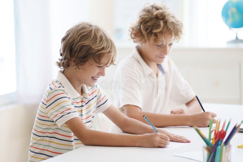Child in School. Student in Class. Boy at Homework Stock Photo - Image ...
