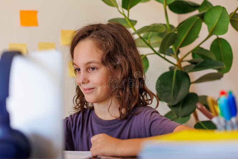 Child at School. the Child Uses a Laptop for Learning Stock Photo ...
