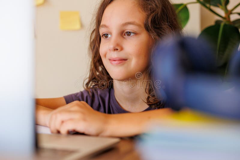 Child at School. the Child Uses a Laptop for Learning Stock Image ...