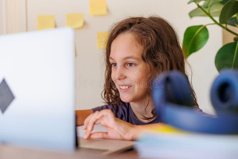 Child at School. the Child Uses a Laptop for Learning Stock Photo ...