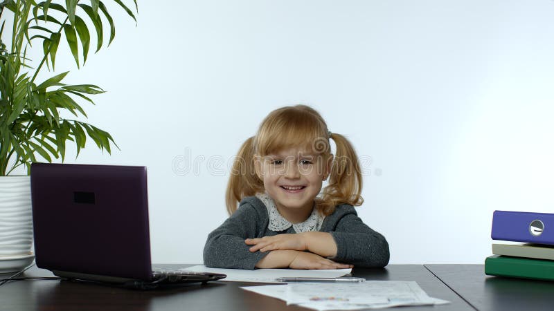 Child Schoolgirl Learn Lessons at Home. Distance Education during ...