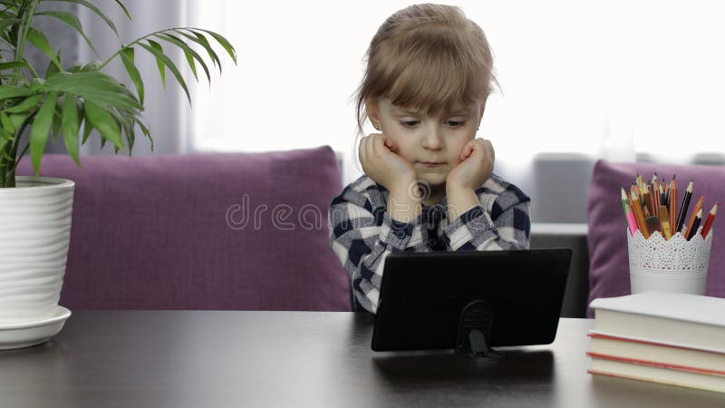 Girl Studying Online Lessons Using Digital Tablet Computer. Distance ...