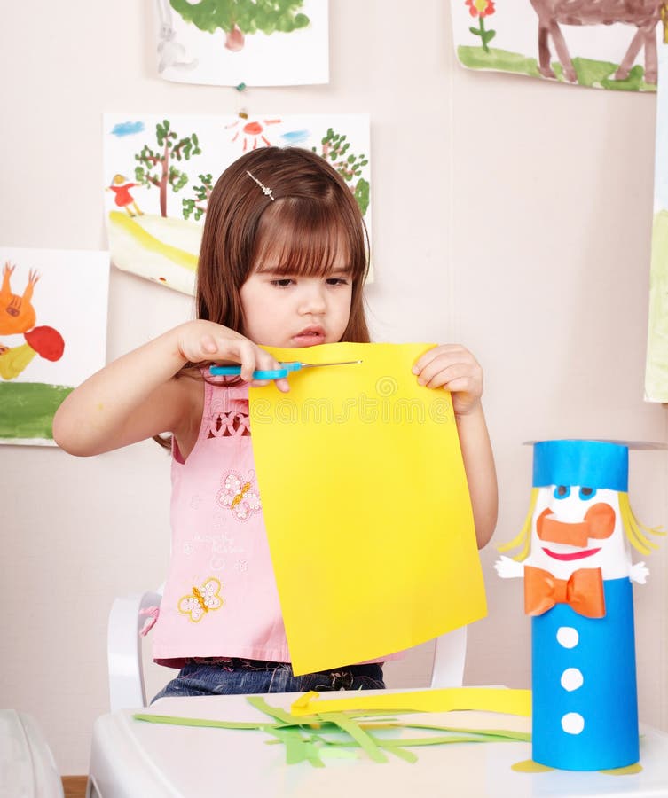 Child with Scissors Cut Paper in Play Room. Stock Photo - Image of ...
