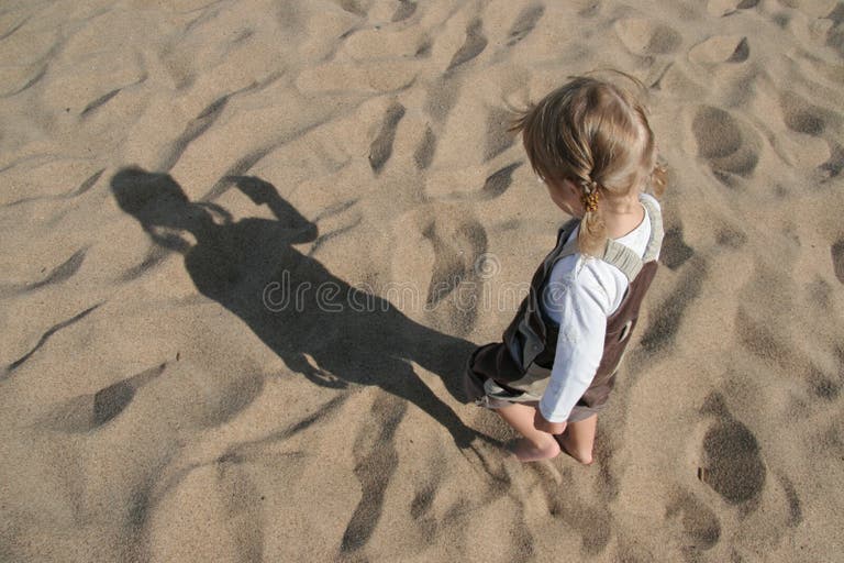 Child and shadow stock photo. Image of beach, children - 1202722