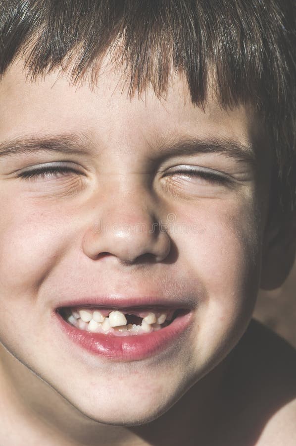 Child shows missing teeth stock photo. Image of front - 66617414
