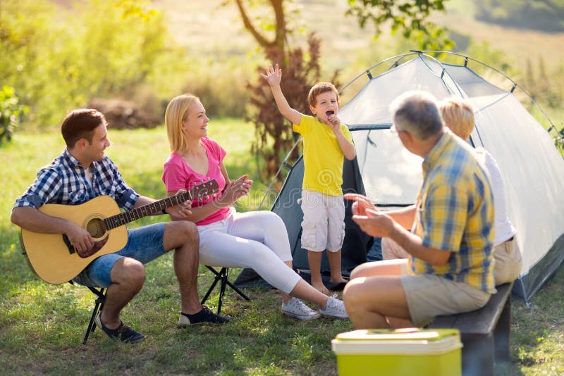 Child singing with family stock photo. Image of holiday - 87881824