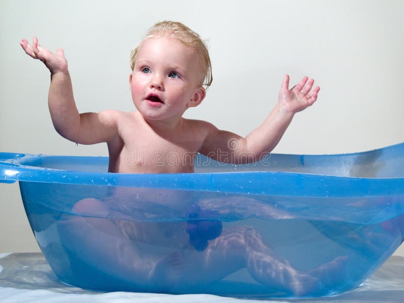 Child sits in bath stock image. Image of child, cheerful - 7530149
