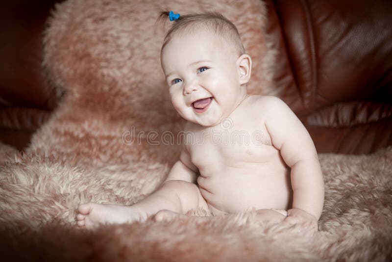 Child sitting on fur stock image. Image of cute, innocence - 28677383