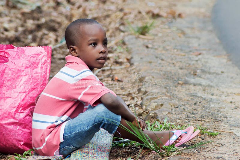 Child Sitting on the Ground Stock Photo - Image of american, watching ...