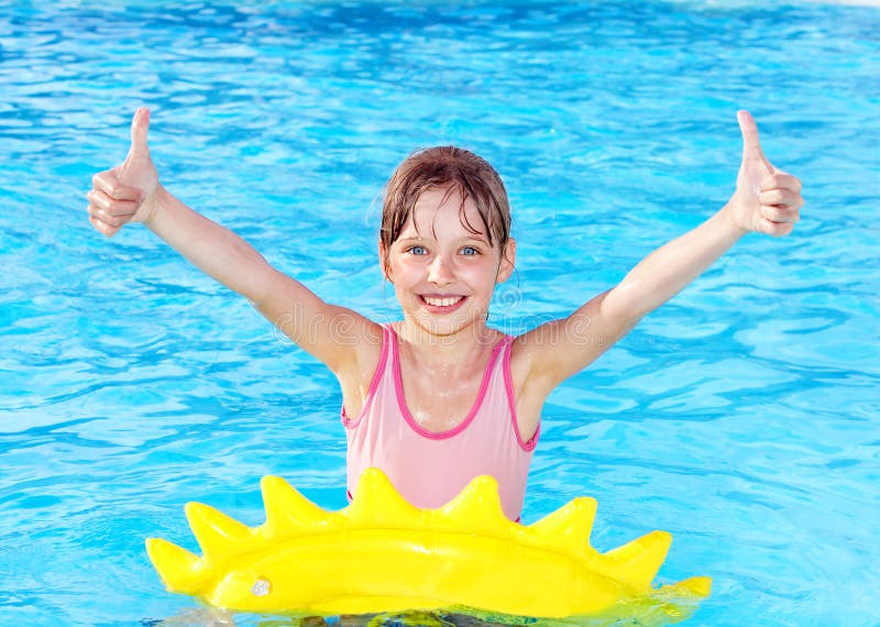 Child Sitting on Inflatable Ring Thumb Up. Stock Photo - Image of smile ...