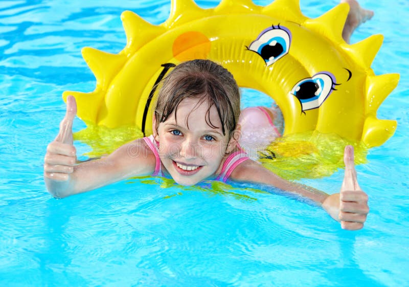 Child Sitting on Inflatable Ring Thumb Up. Stock Image - Image of ...
