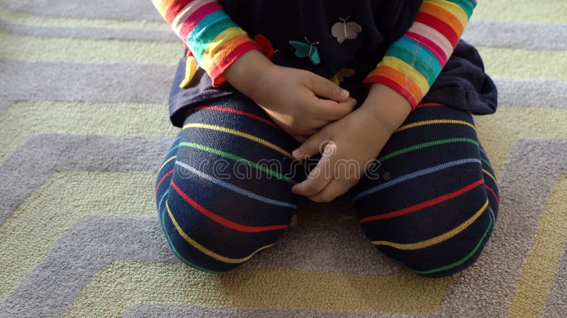 Child Sitting W Posture on the Floor . Stock Video - Video of unhealthy ...