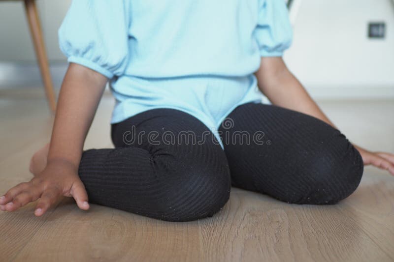 Child Sitting W Posture on the Floor . Stock Image - Image of children ...