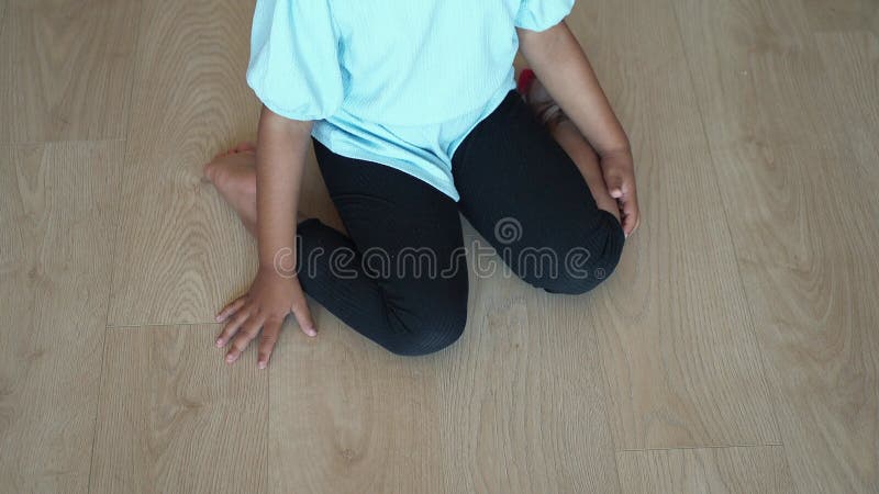 Child Sitting W Posture on the Floor . Stock Footage - Video of ...
