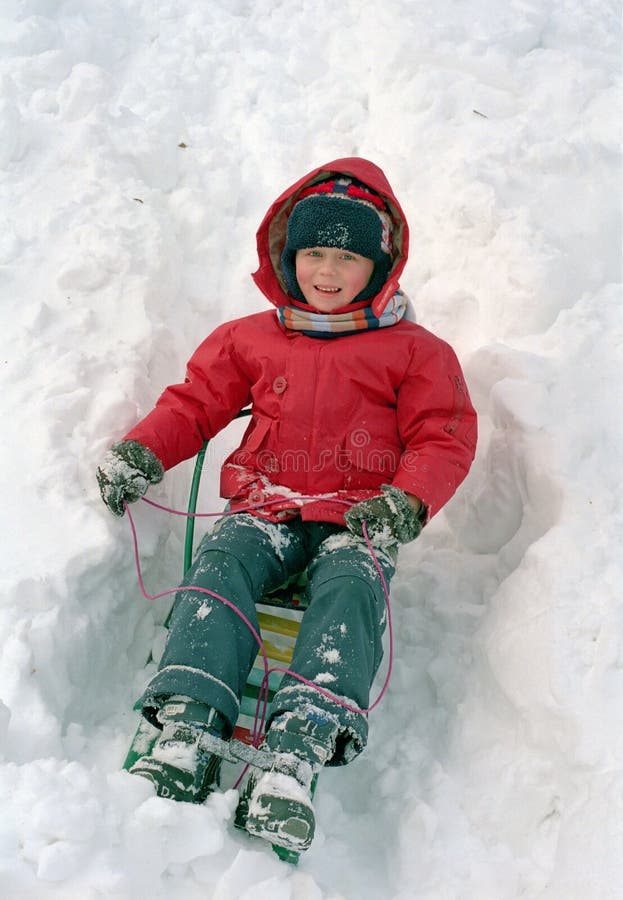 Child sledge on snow stock image. Image of cold, human - 12459497
