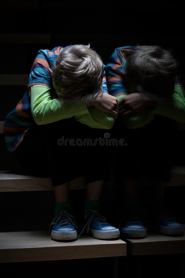 Sleepy Boy on Stairs at Night Stock Photo - Image of sitting, child ...