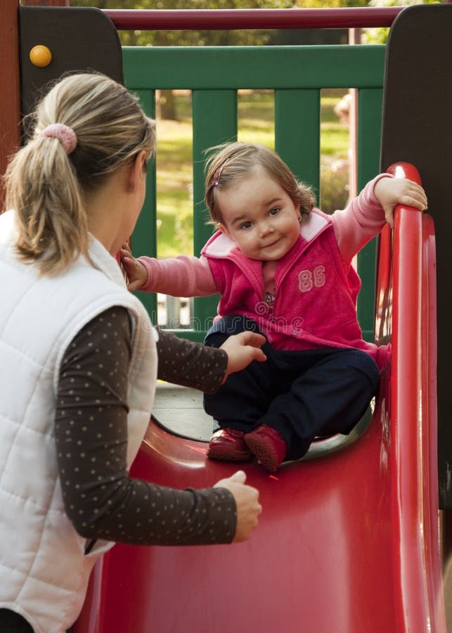 Child on a slide stock image. Image of childhood, cute - 15296029