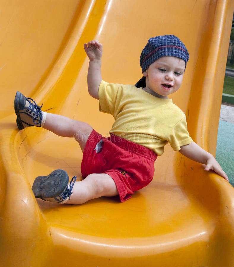 Child on a slide stock image. Image of leisure, entertainment - 15399209