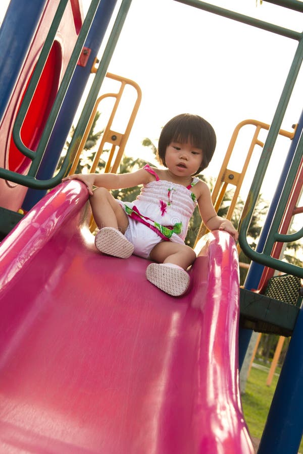 Child on a slide stock image. Image of childhood, cute - 15296029