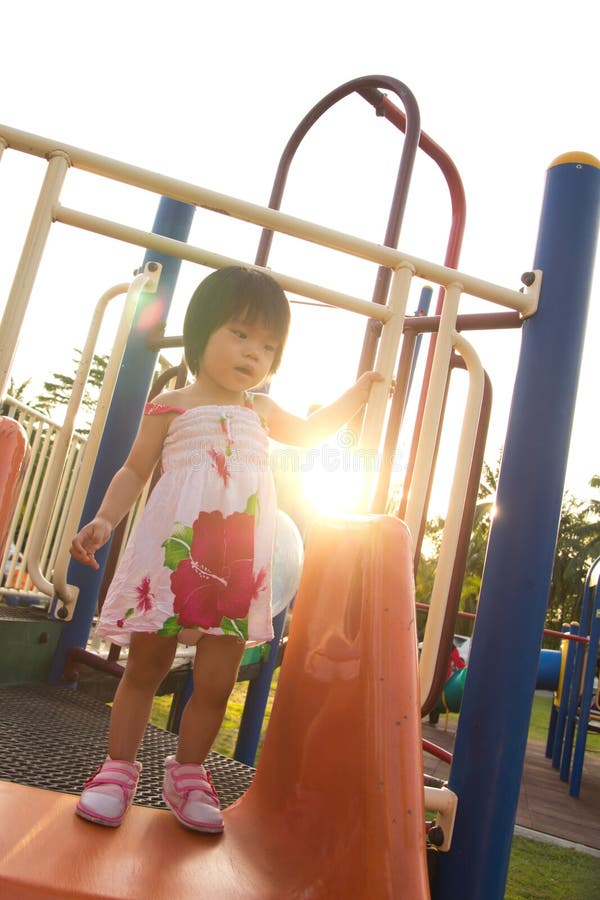 Child on a Slide in Playground Stock Image - Image of playing, activity ...