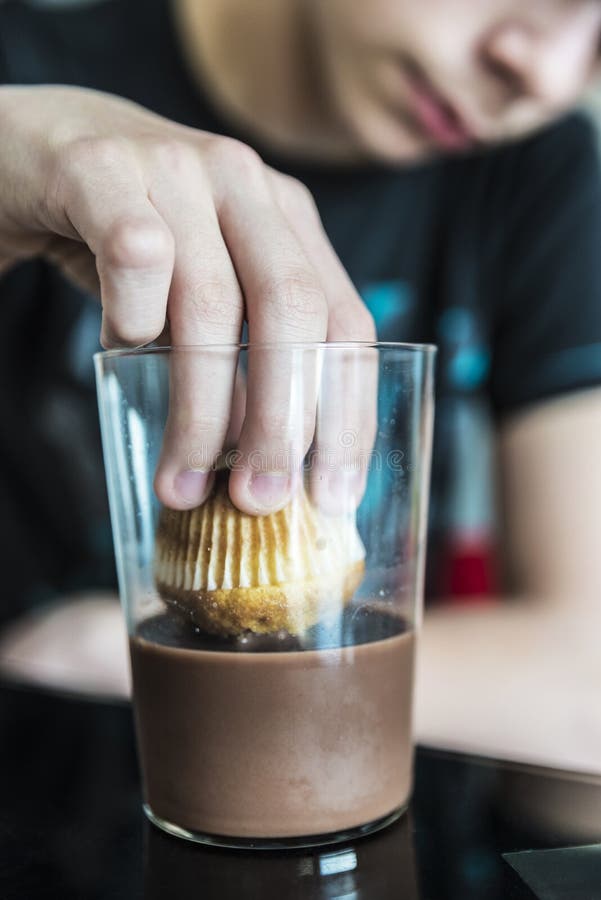 Child smearing a cupcake stock photo. Image of confectionery - 71802548