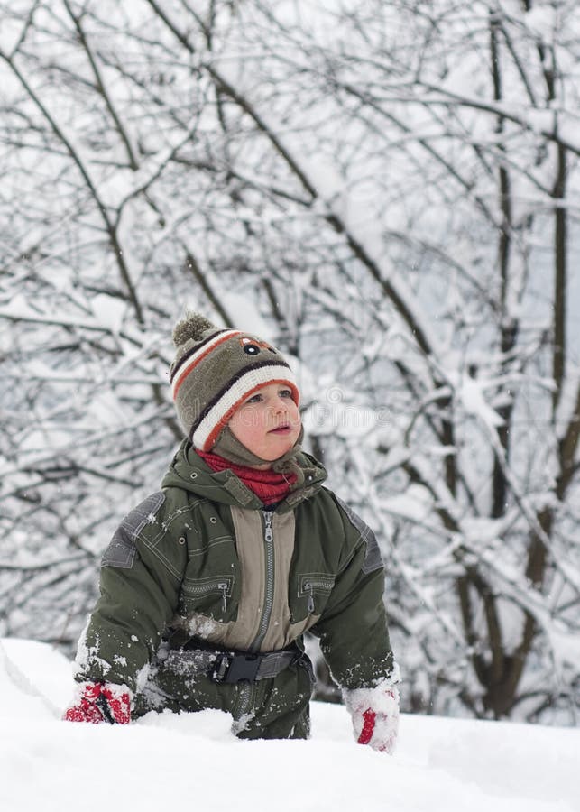 Child in snow stock photo. Image of childhood, cold, romper - 26445992