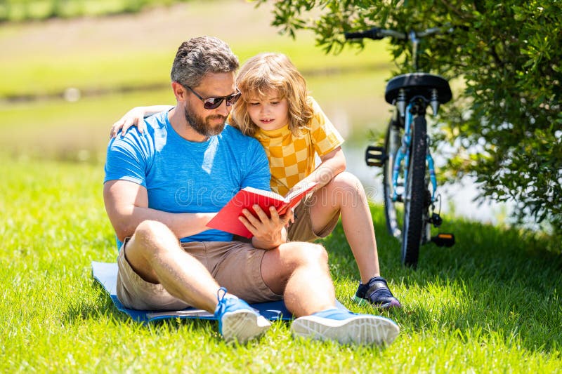 Child Son Learning with Dad Outdoor. Father and Son Bonding through ...