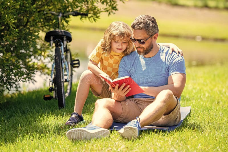 Child Son Learning with Dad Outdoor. Father and Son Bonding through ...