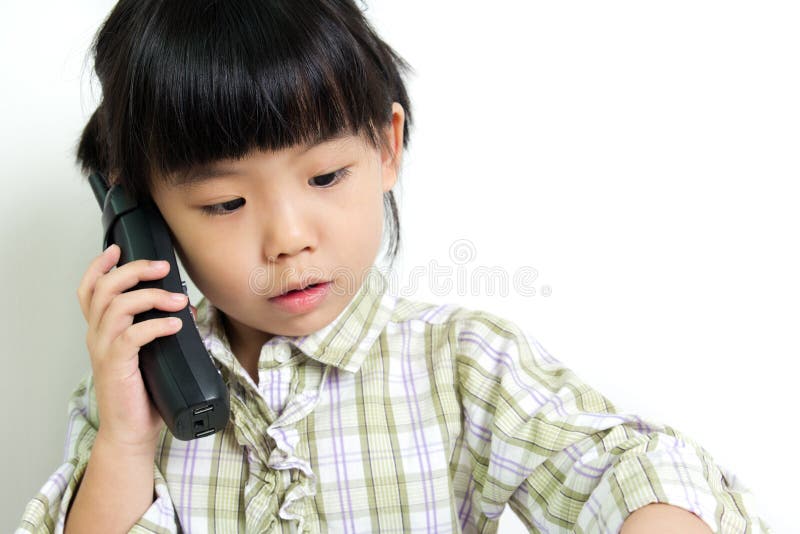 Child Speaking on the Phone Stock Photo - Image of cute, children: 25444590