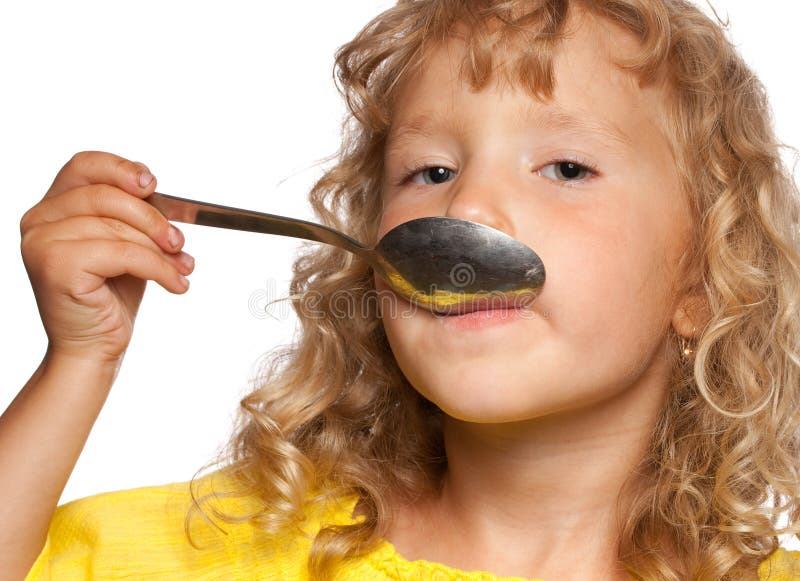 Kid with spoon stock image. Image of smiling, person - 49246589