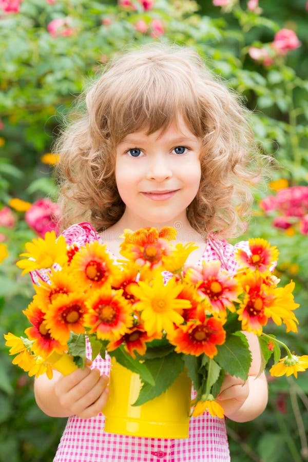 Pretty Little Girl with Bouquet of Flowers Roses. Stock Image - Image ...