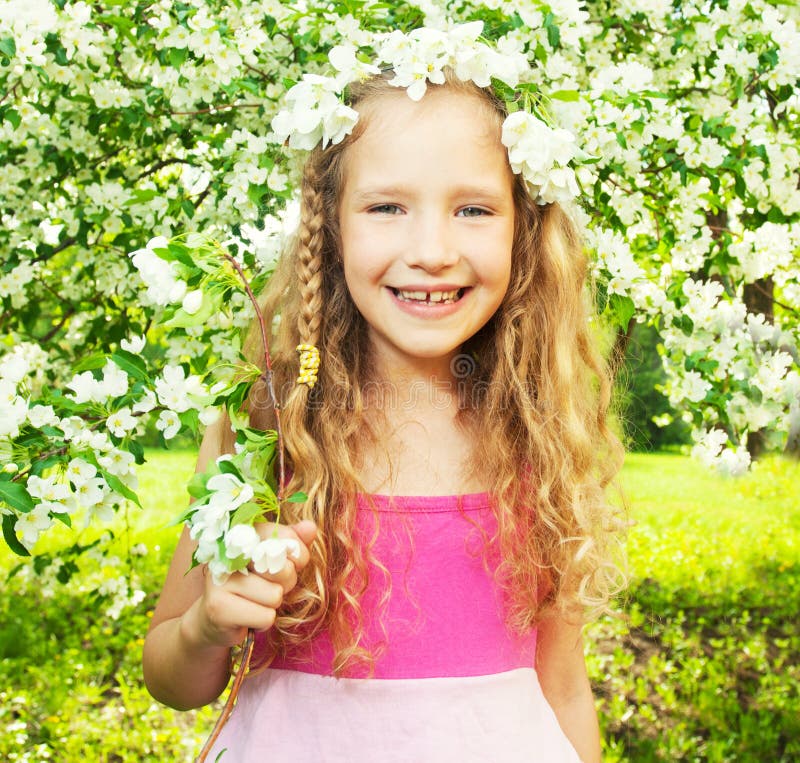 Child at spring stock image. Image of field, flower - 142036997