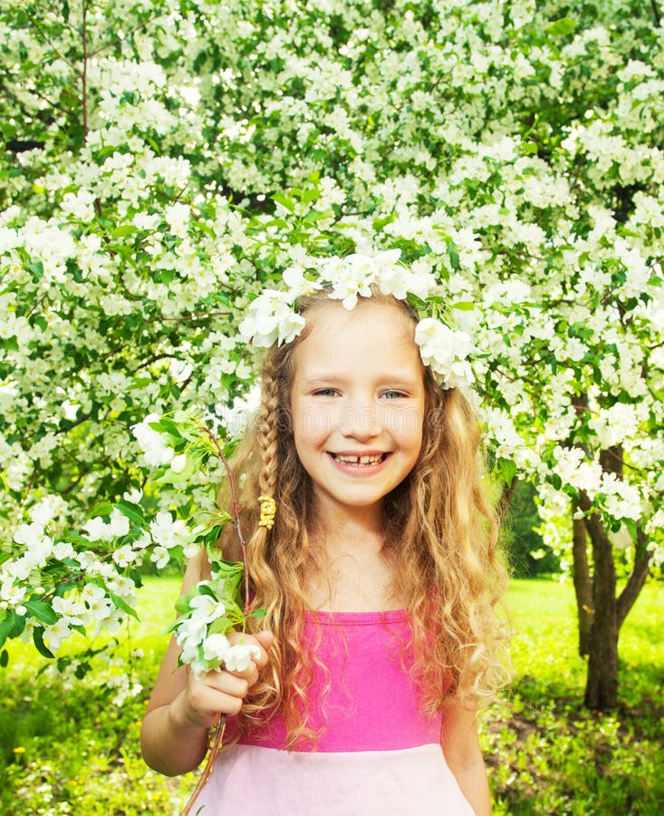 Child at spring stock photo. Image of flower, preschooler - 215405234