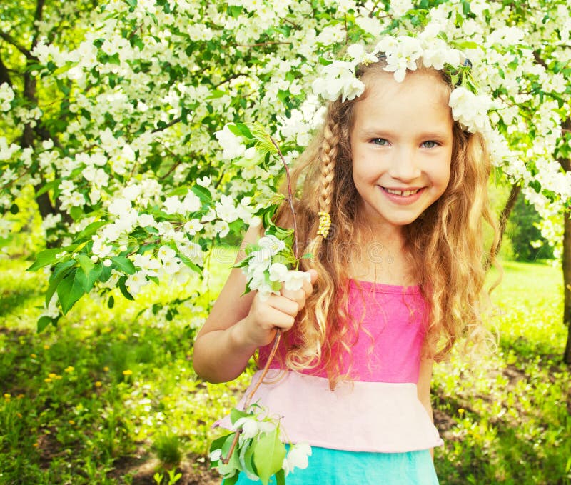 Child at spring stock image. Image of beauty, field, tree - 49661847