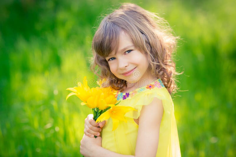 Child in spring park stock photo. Image of tulip, bouquet - 66956290