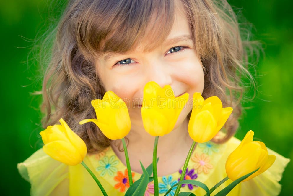 Child in spring park stock image. Image of happy, tulip - 67056697