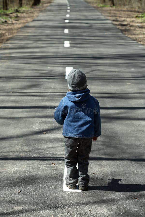 Child Standing on a Countryside Road Stock Image - Image of trip ...