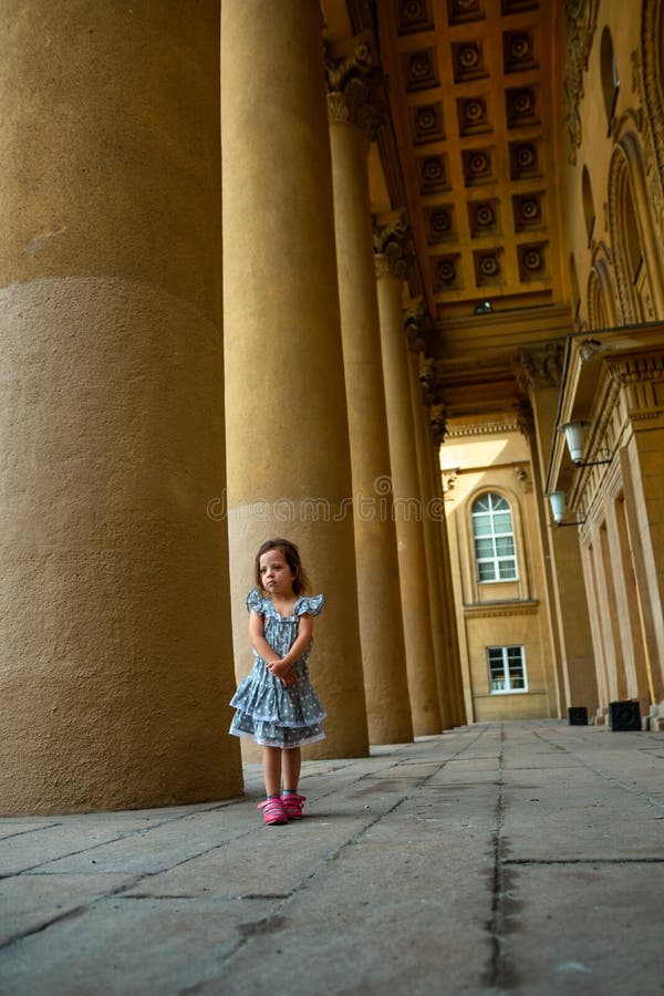 The Child is Standing Near a Column Stock Image - Image of child, house ...