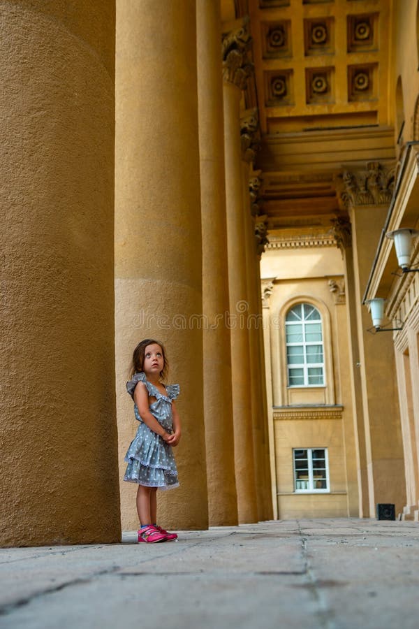 The Child is Standing Near a Column Stock Photo - Image of museum ...