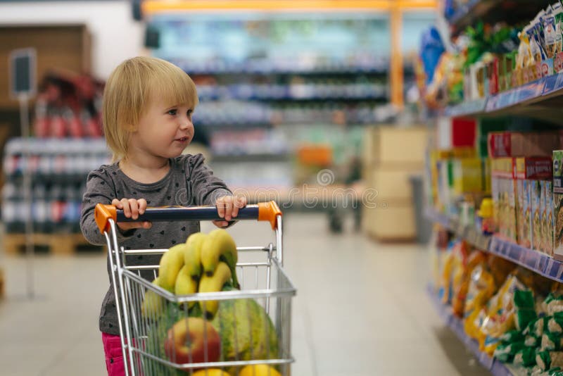 Sale, Consumerism And People Concept - Happy Little Girl In Shopping ...
