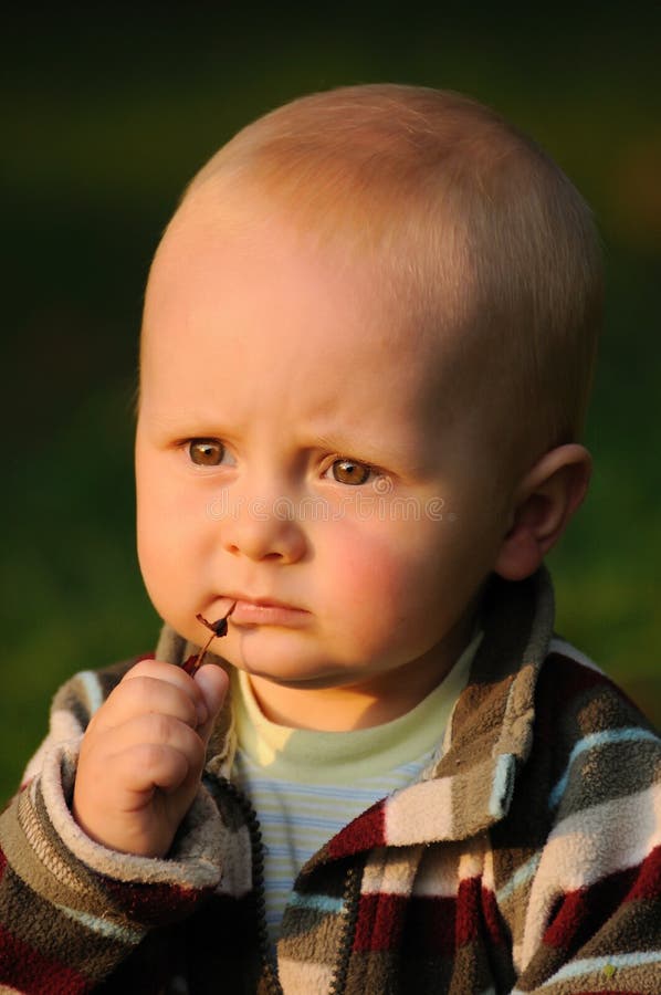 Child with straw in mouth stock image. Image of mouth - 26585413
