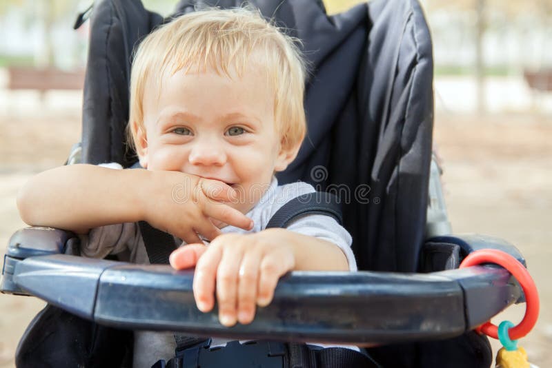 Child in stroller stock photo. Image of outside, childhood - 38943280